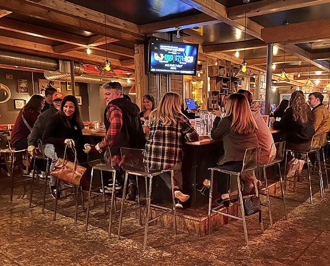 The bar area hums with the energy of locals and visitors united by a common purpose: experiencing some of Michigan's finest barbecue in good company.