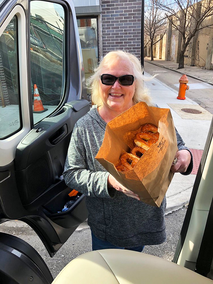 The universal expression of pretzel joy knows no age limit. That smile says, "I've found carb nirvana, and I'm bringing some home." 