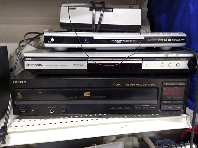 The electronics graveyard where Sony players go for their second act. That 5-disc CD changer remembers when Fleetwood Mac was sold in plastic cases.