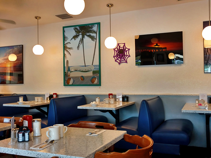 Beach-inspired artwork and cozy booths create that "everybody knows your name" vibe that keeps regulars coming back for decades.