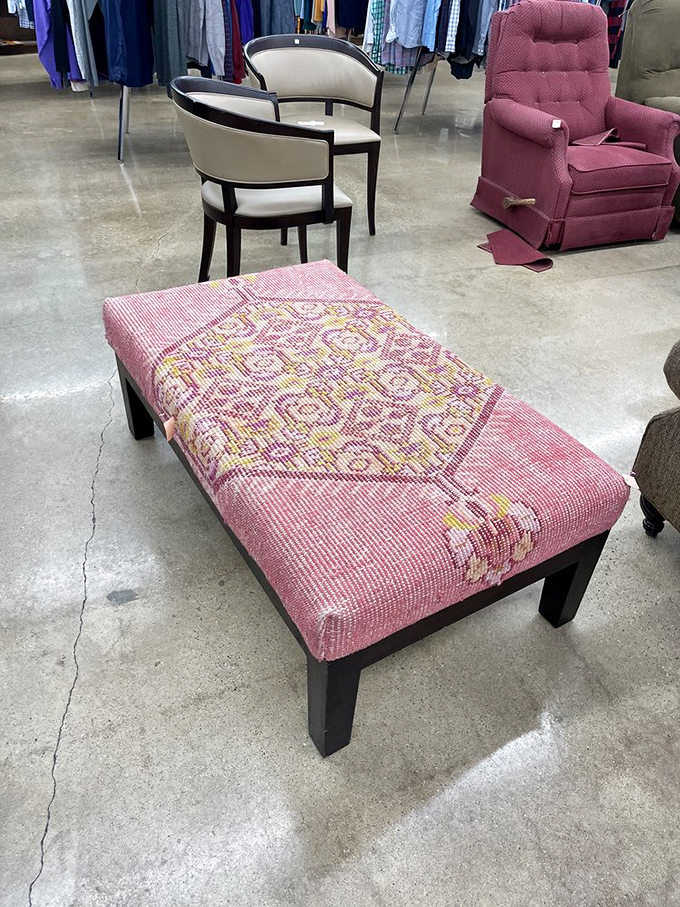 This pink ottoman didn't end up here by accident&mdash;someone's spouse finally won the "that doesn't match anything we own" argument.