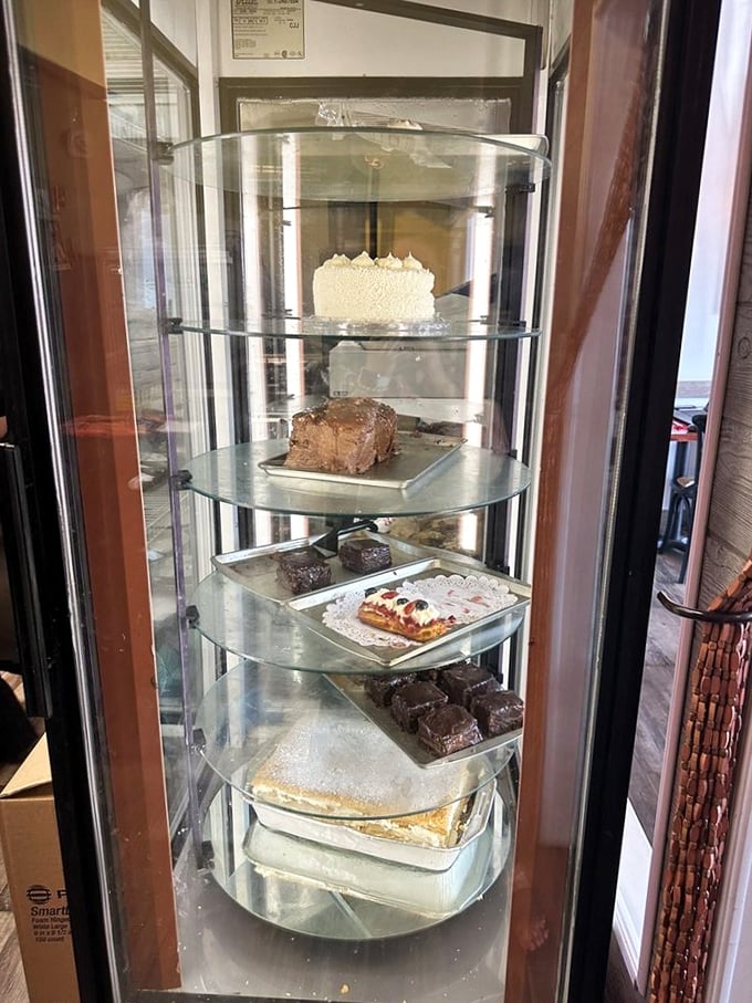 The dessert case&mdash;where willpower goes to die. Each shelf offers sweet temptation that makes "just looking" the biggest lie you'll tell yourself today.