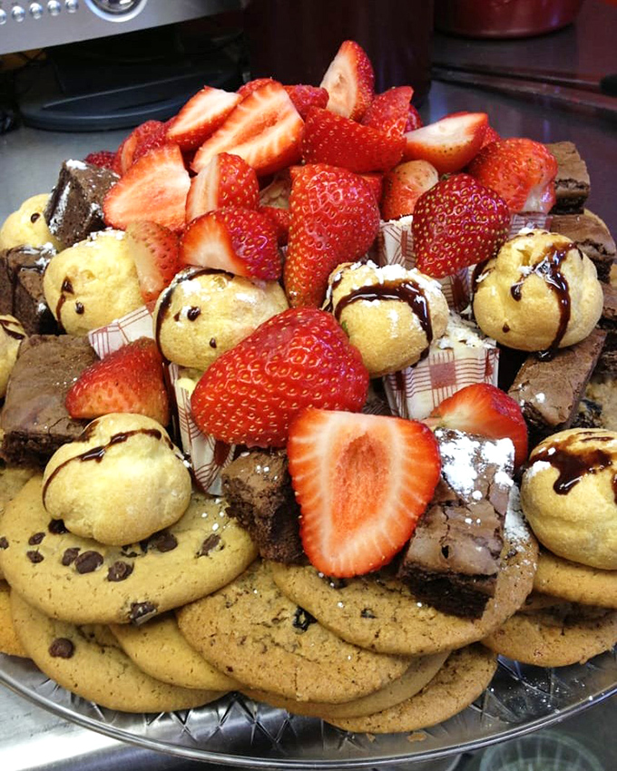 Not just dessert&mdash;it's a celebration on a plate. Cookies, brownies, and fresh strawberries arranged with the kind of generosity that makes you feel instantly welcome.