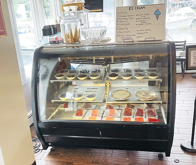 The dessert case stands as a sweet siren, calling to you despite your protests that you couldn't possibly eat another bite.