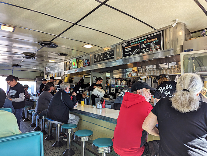 The counter seating offers front-row tickets to the short-order cooking show, where regulars exchange friendly banter with staff between sips of coffee.