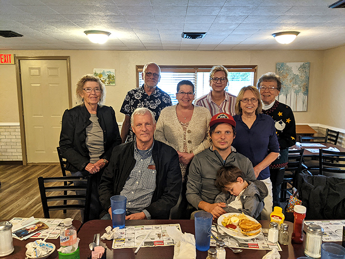 Every small town has its morning gathering spot where local news travels faster than the internet, and breakfast is just the excuse.