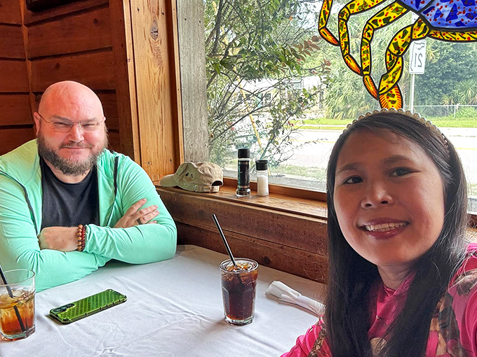 Happy diners experiencing that moment when good food creates good memories. The smiles say it all.