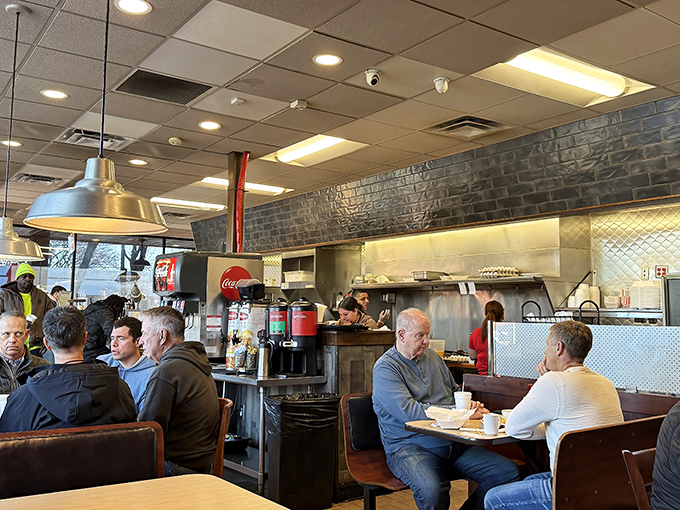 Where strangers become friends over shared breakfast enthusiasm. Nothing builds community faster than witnessing someone's first bite of biscuit heaven.