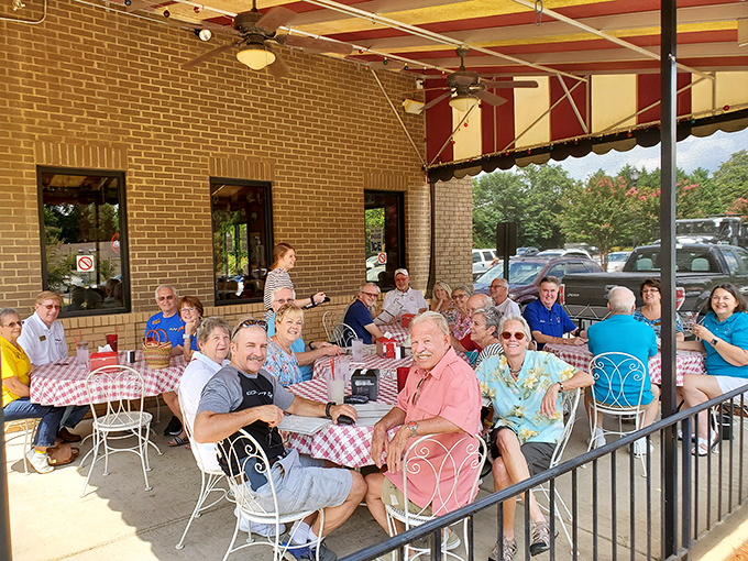 The outdoor patio where strangers become friends over sweet tea and shared appreciation for food that doesn't need a translator to understand.