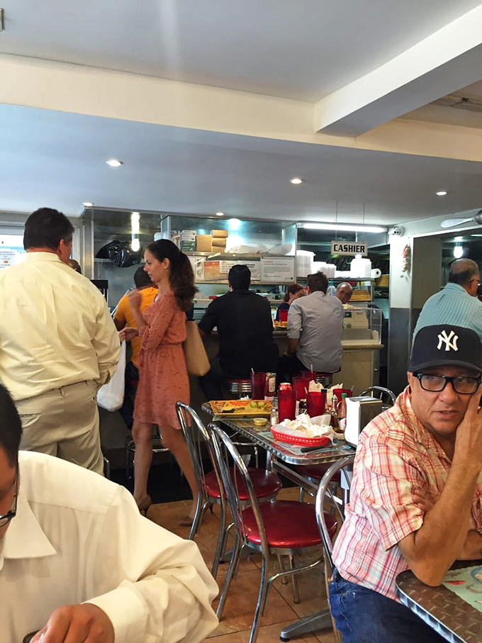The lunch rush &ndash; a beautiful symphony of hungry patrons. Where Yankees caps and business attire meet in democratic appreciation of honest, delicious food.