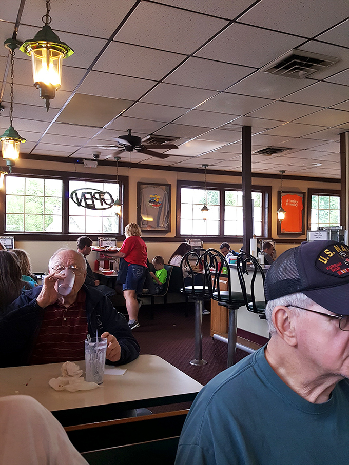 The dining room hums with conversation and satisfaction. These aren't customers&mdash;they're regulars who've earned their booth privileges.