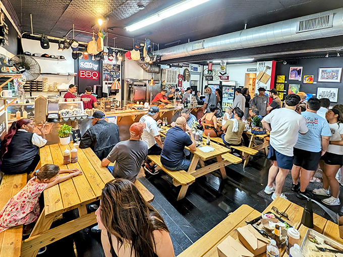 The weekend crowd at 2Fifty proves that great barbecue, like great music, brings people together across all demographics and dietary intentions.