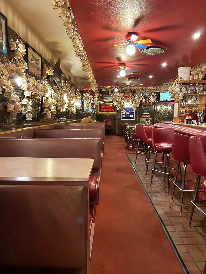Red vinyl booths and wood paneling create the kind of atmosphere where memories are made and diet plans are temporarily forgotten.