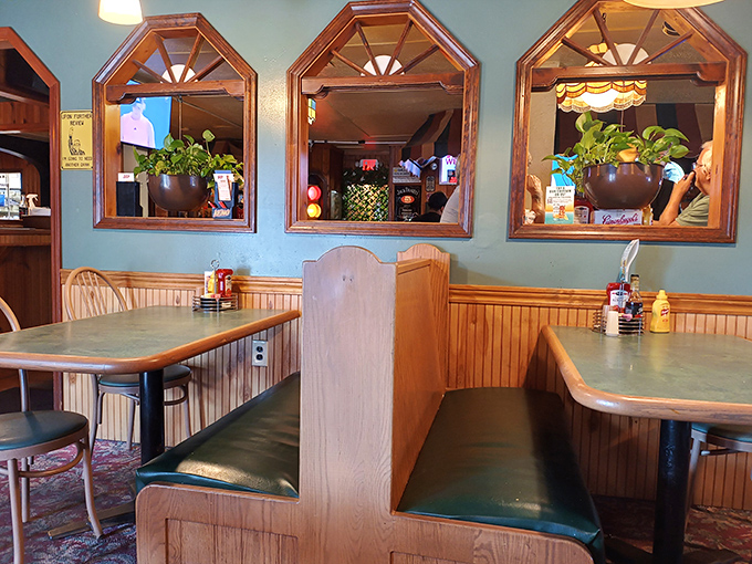 Classic wooden booths with just the right amount of wear&mdash;each one could tell stories of proposals, breakups, and "remember when" conversations.