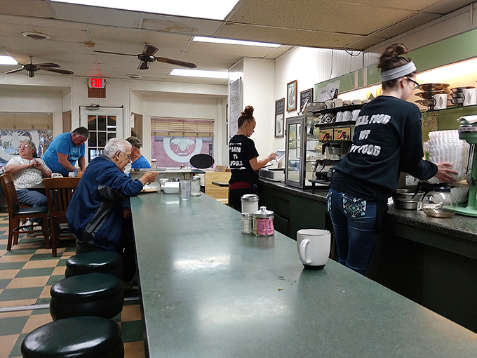 At the counter, where coffee cups are always full and conversations flow freely, you'll find the beating heart of this beloved eatery.