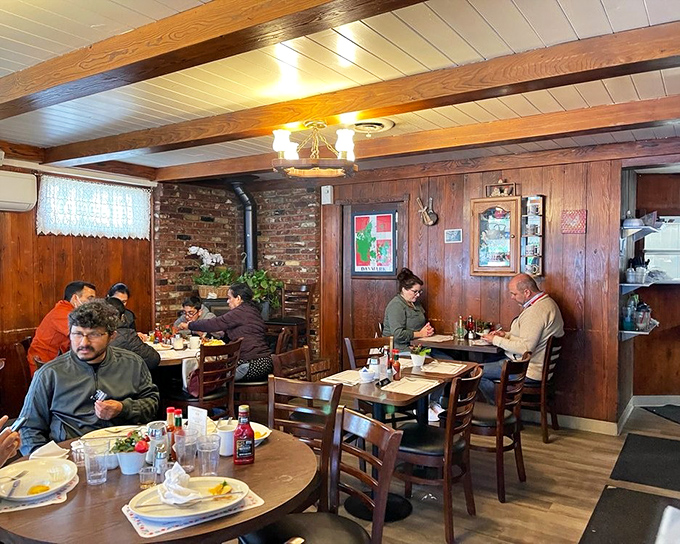 The dining room hums with the universal language of good food. Notice how nobody's looking at their phones? That's the Paula's effect.