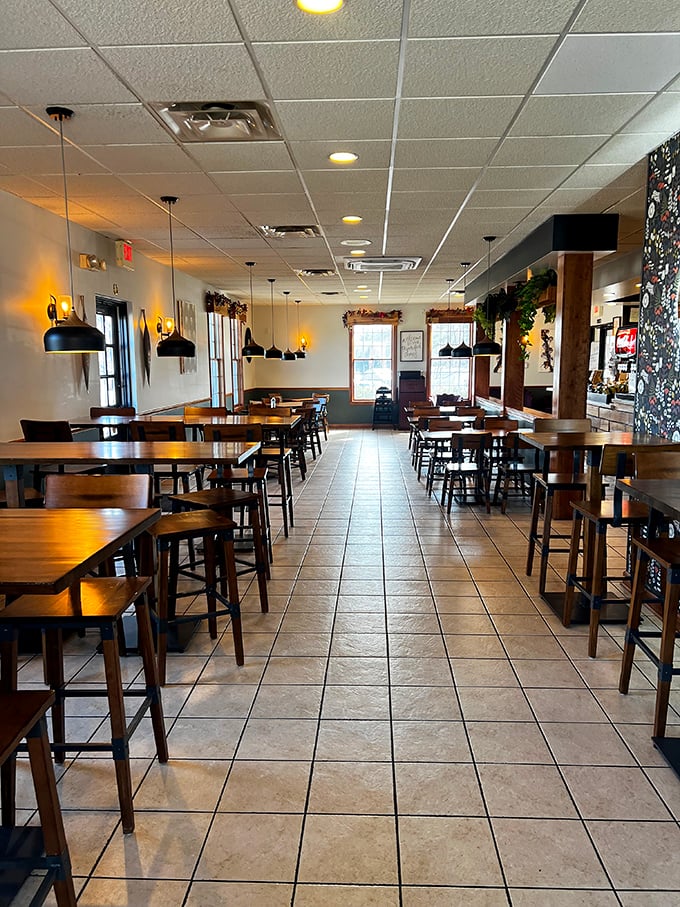 Clean lines, warm wood, and thoughtful spacing make this dining room feel like someone's actually thought about your comfort while eating.