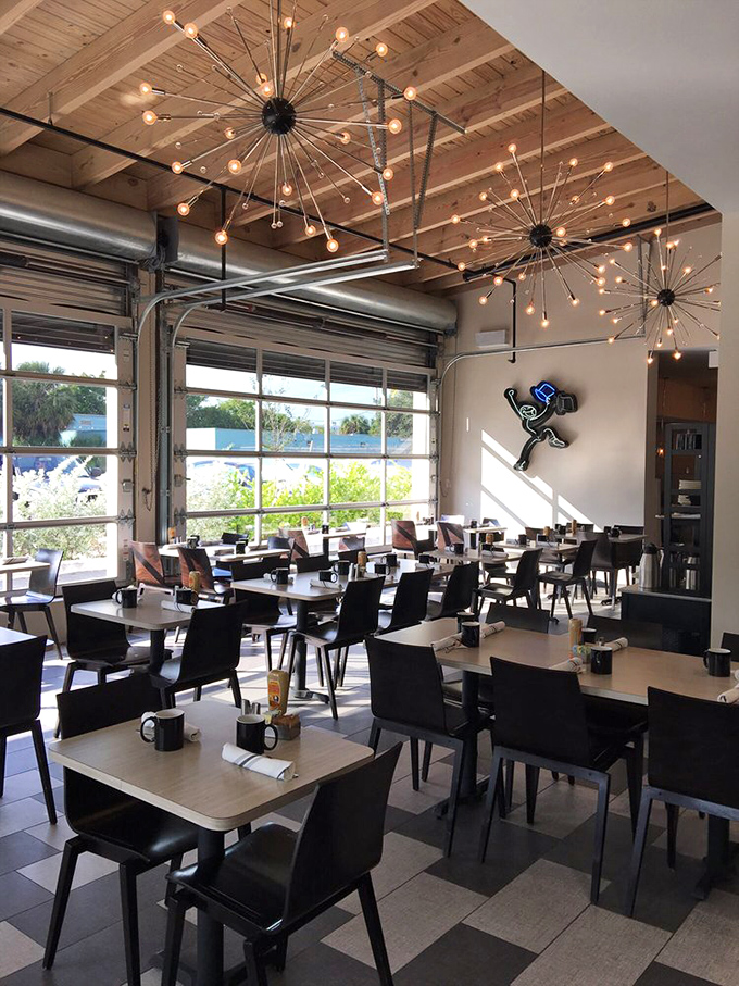 Modern lighting fixtures that look like they escaped from a design magazine illuminate a space where comfort meets contemporary style.