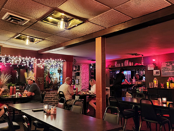 In the warm glow of string lights, diners settle in for an evening where good food and better company make time stand wonderfully still.