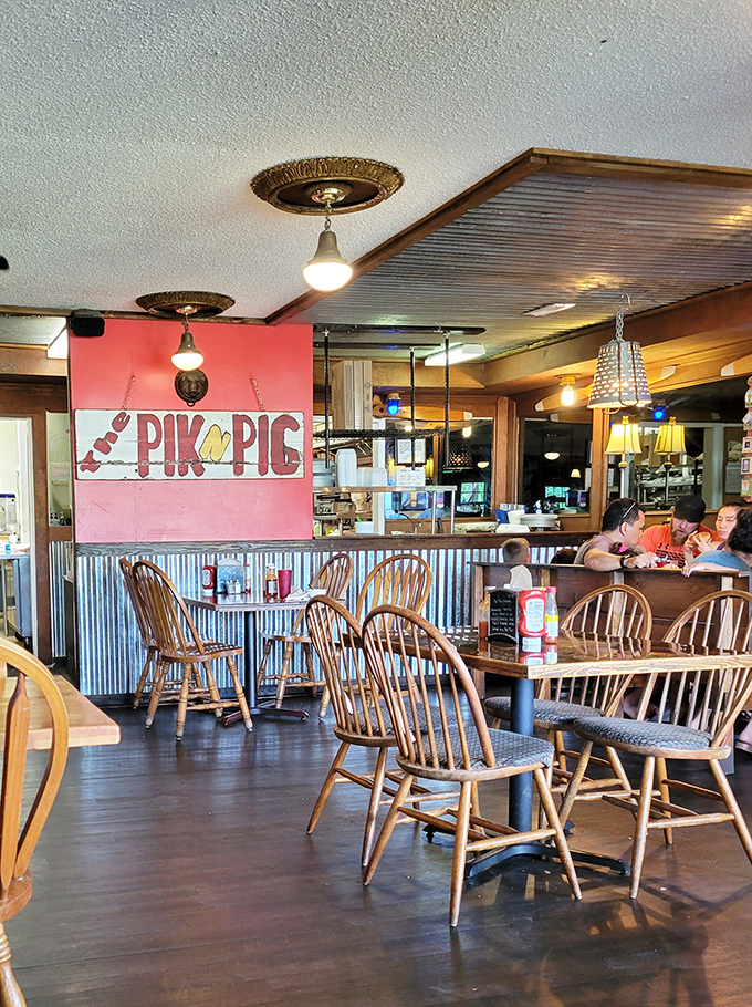 Windsor chairs and wooden tables that have heard thousands of "mmms" and "oh my gods." The dining room's red walls practically vibrate with satisfaction.
