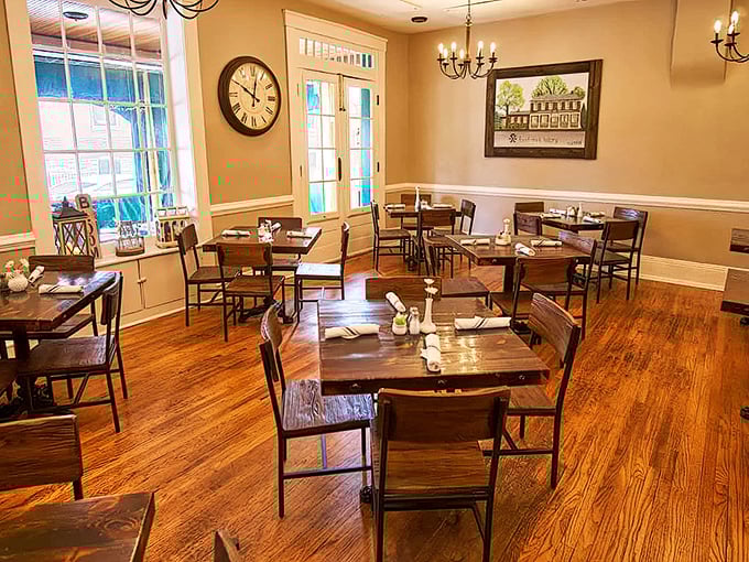 The dining room strikes that perfect balance between "special occasion" and "Tuesday night dinner," with warm wood tones and natural light creating instant comfort.