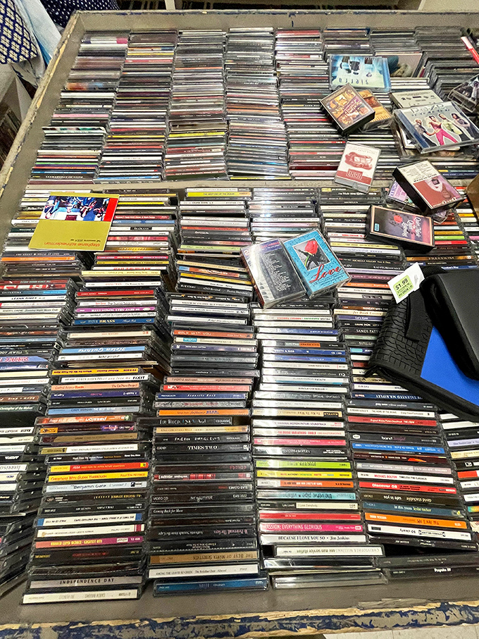 CD and cassette heaven for music archaeologists! Somewhere in this glorious pile is the soundtrack to your high school years, waiting to be rediscovered.