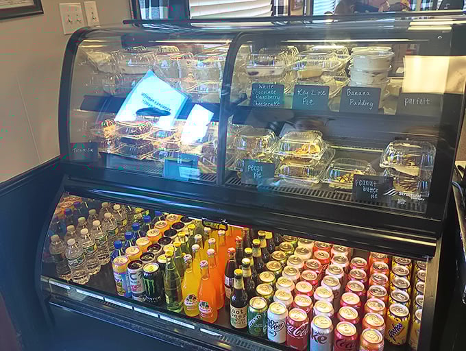 The dessert case tempts with homemade pies while the drink selection reminds you that sometimes a cold soda is the perfect companion to comfort food.