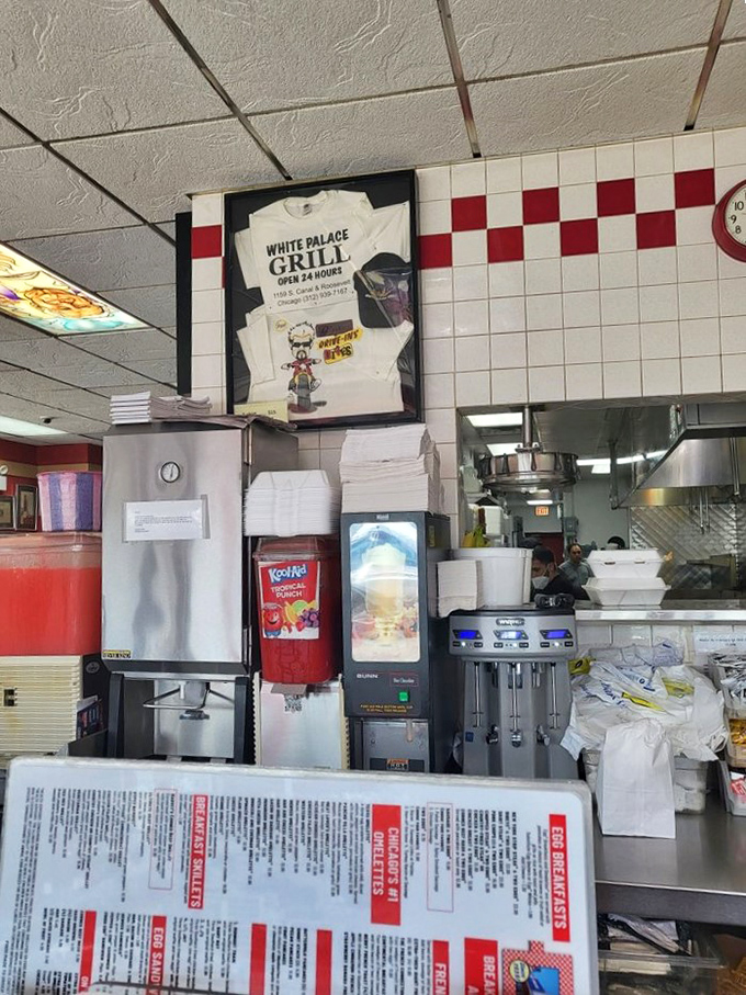Behind the scenes magic: where Kool-Aid meets coffee makers and framed t-shirts remind you this isn't some fancy schmancy joint&mdash;it's the real deal.