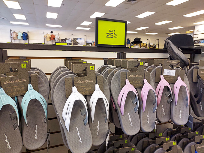 Eddie Bauer flip-flops lined up like soldiers ready for summer duty. At these prices, you might as well get a pair in every pastel shade.