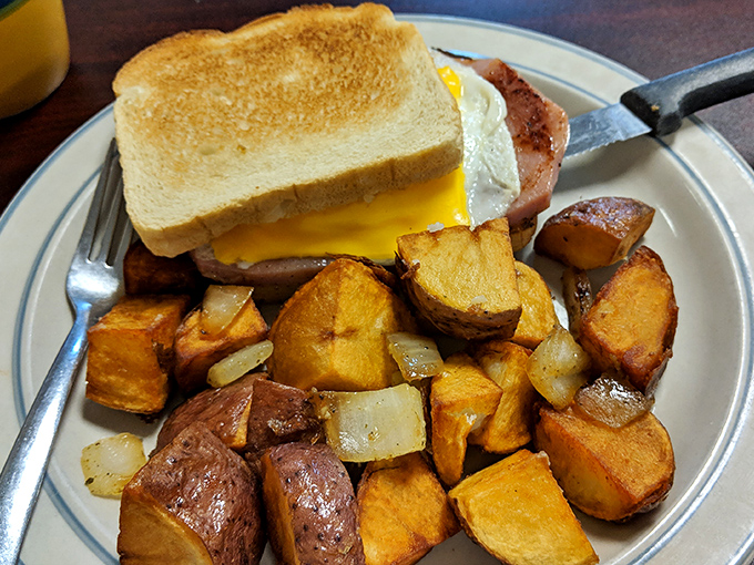 The breakfast sandwich and home fries combo that makes you question why anyone would skip the most important meal.