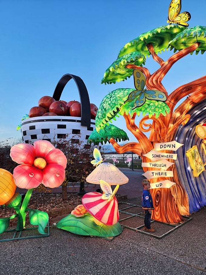 Whimsical fantasy elements create a wonderland setting where the giant basket seems perfectly at home among oversized flowers and mushrooms.