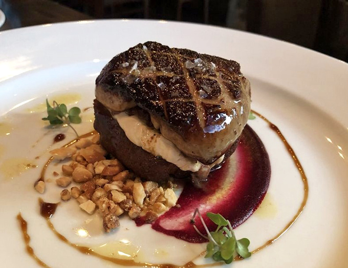 This isn't just steak&mdash;it's a culinary sonnet, perfectly seared and paired with a vibrant beet reduction that makes the plate look like edible art.