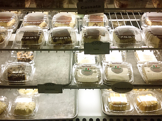 The pastry case—where willpower goes to die and "I'll just look" becomes "I'll take one of each" faster than you can say cannoli.
