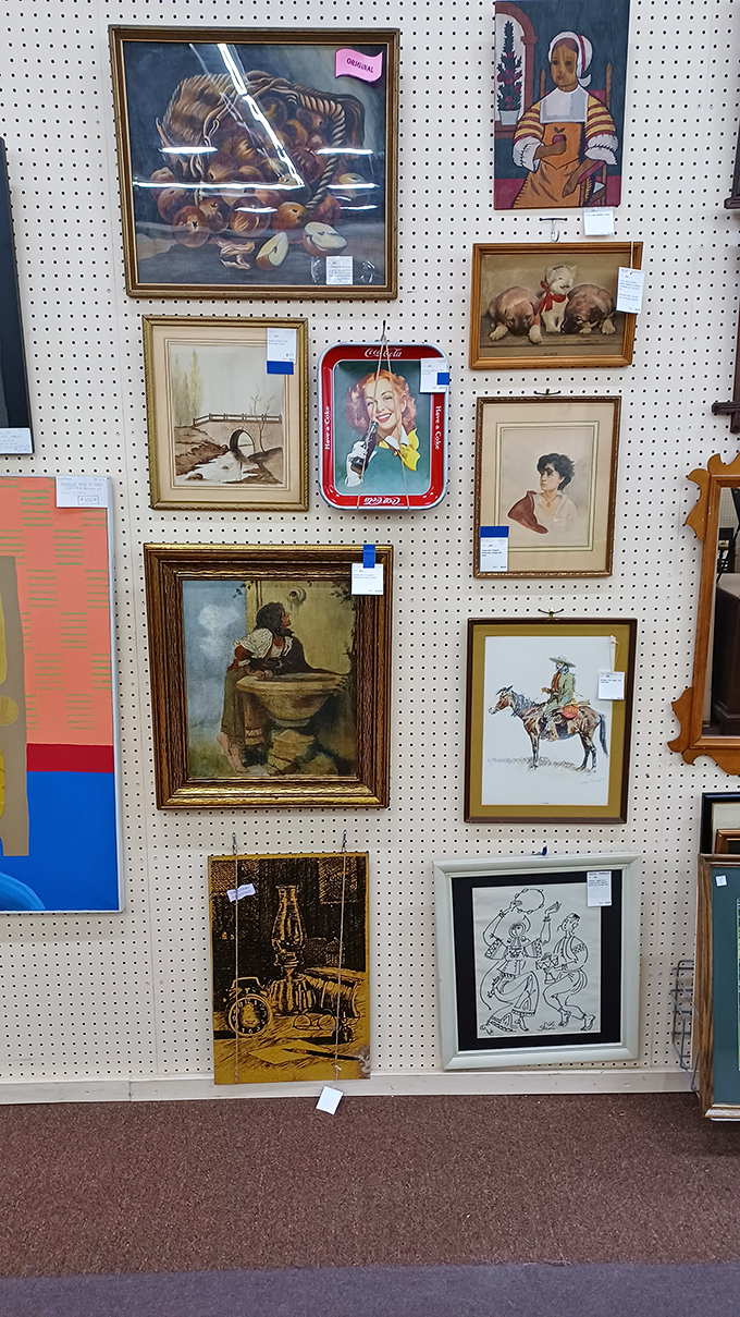 A gallery wall of affordable art spans decades and styles. From still lifes to portraits, these pieces once adorned someone's cherished living space.