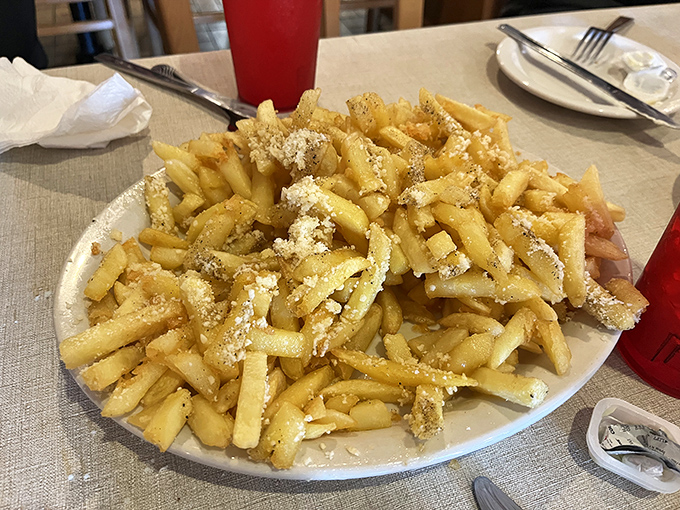 Even the french fries get the Italian treatment here, dusted with parmesan like snow on the Alps. Potato perfection that refuses to be a mere side dish.