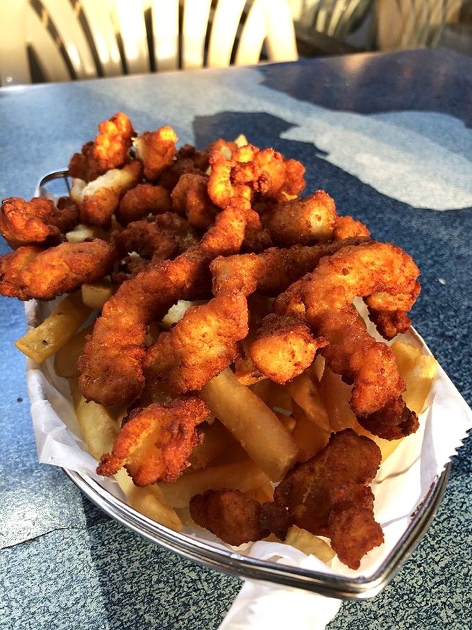 A basket of fried goodness that makes sharing difficult. These golden morsels have started more dinner table negotiations than international diplomacy.