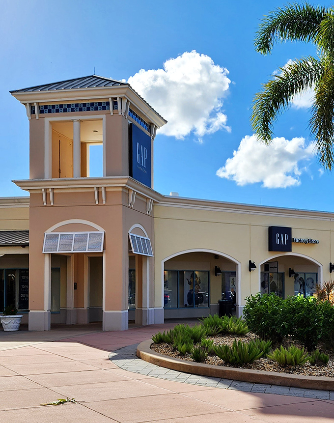 GAP Factory Store's tower stands like a retail lighthouse, guiding shoppers toward basics that somehow never go out of style.