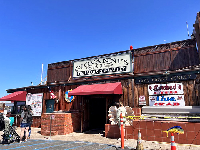 Fish markets with lines of cars proving that word-of-mouth advertising still trumps fancy marketing campaigns every time.