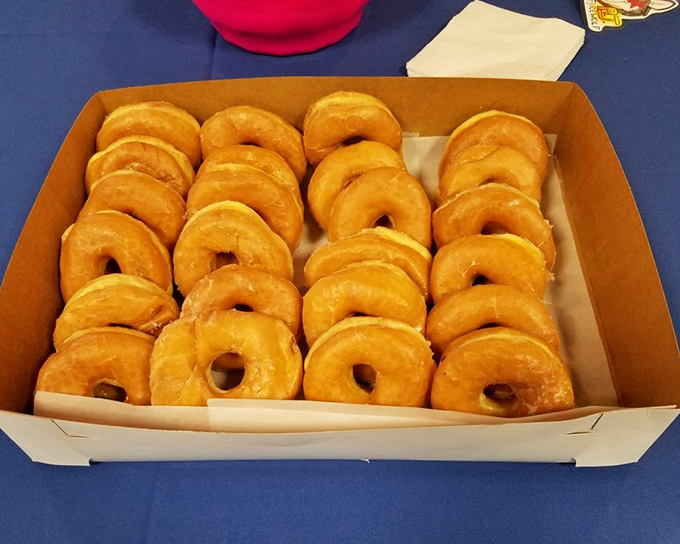 A box of glazed donuts lined up like soldiers&mdash;if soldiers were delicious, golden-brown, and caused spontaneous happiness rather than warfare.