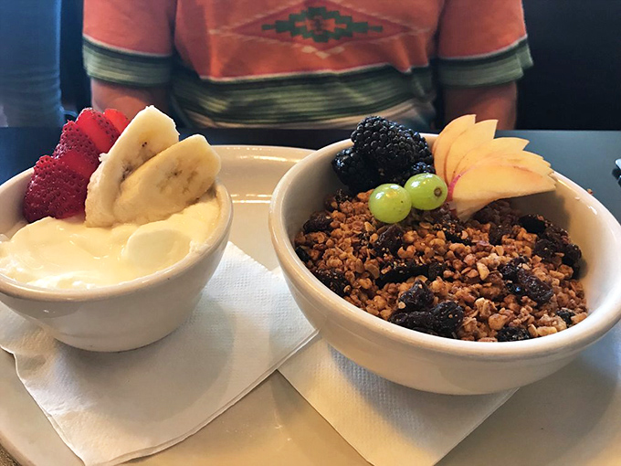 Yogurt and granola that somehow makes healthy eating feel indulgent. Fresh fruit adds pops of color that Instagram filters wish they could replicate.