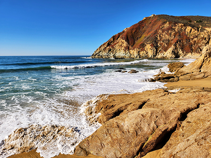 Nature's drama: Gray Whale Cove's rugged shoreline and golden cliffs create the kind of view that makes smartphone cameras feel wholly inadequate.