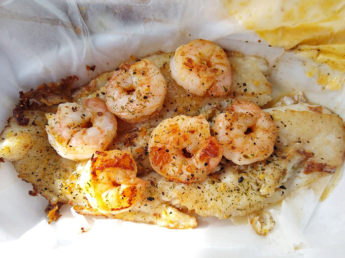 Succulent grilled shrimp nestled against flaky white fish&mdash;a seafood duet that sings with simple seasoning and perfect execution.