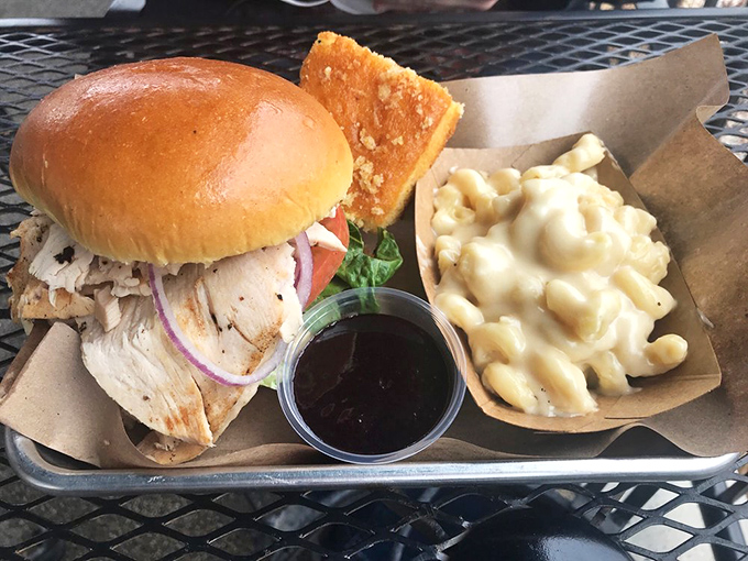 A chicken sandwich that proves poultry deserves respect in the barbecue world, especially with that mac and cheese sidekick.