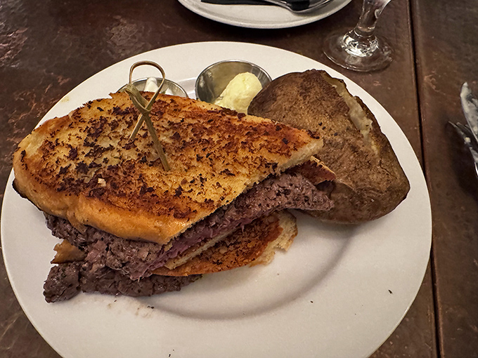 This isn't just a sandwich—it's architecture. Layers of tender beef between perfectly grilled bread create the skyscraper of lunch options.