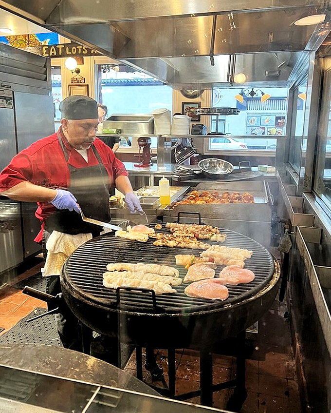 Culinary theater at its finest &ndash; watching seafood transform over mesquite flames. This isn't just cooking; it's a performance art that engages all senses before the first bite.