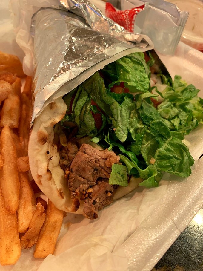 This isn't just a gyro&mdash;it's a Mediterranean vacation wrapped in warm pita. Those fries are just showing off at this point.