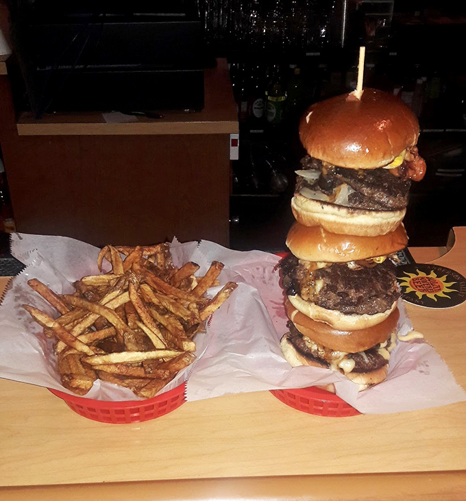 The Hall of Famer isn't just a burger&mdash;it's a skyscraper of satisfaction that requires a game plan, a napkin strategy, and absolutely no fear of heights.