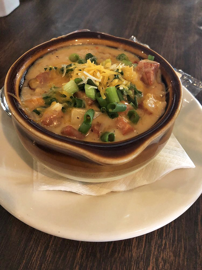 A hearty soup that's practically a meal, topped with green onions and cheese&mdash;the kind of dish that makes Cleveland winters almost bearable.