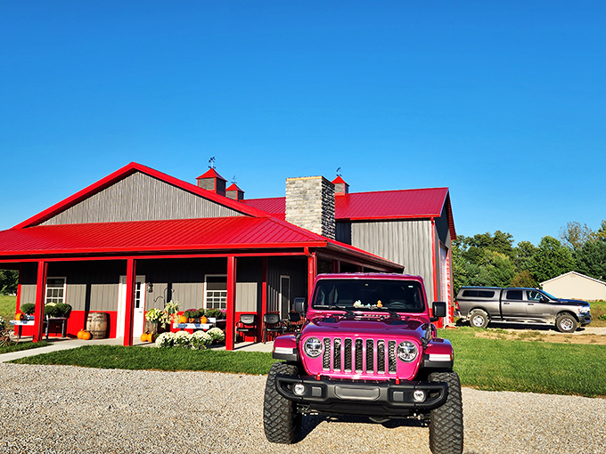 Rural charm with a splash of pink. This Jeep and red-roofed barn combo is the Midwest's answer to coastal living magazine spreads.