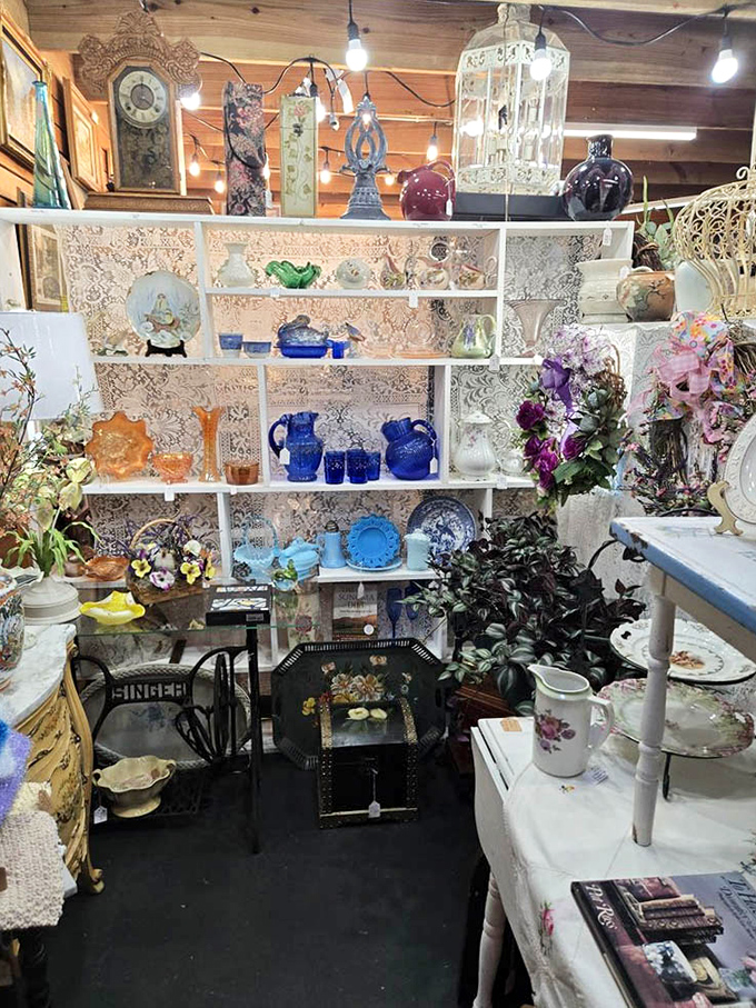 Delicate glassware and vintage china create a symphony of color and elegance. That cobalt blue pitcher is practically begging to come home with me.
